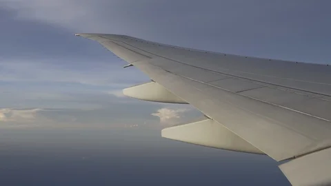 plane wing flying in the sky, view of sh... | Stock Video | Pond5