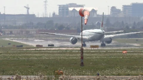 Planes on airport runway in severe heatw... | Stock Video | Pond5