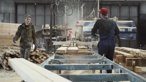 Plank Cutting Process With A Heavy Tool ... | Stock Video | Pond5