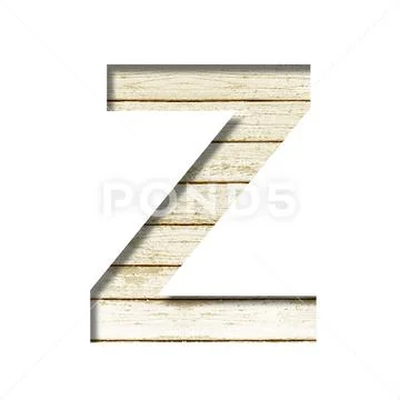 Photograph: Plank wall font. The letter Z cut out of paper on a old ...