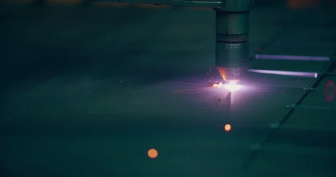 Plasma laser cutting metal sheet with sp... | Stock Video | Pond5