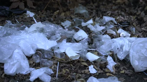 Plastic bag falling down on litter landf... | Stock Video | Pond5