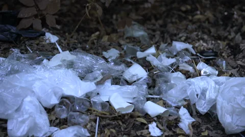 Plastic bag falling down on litter landf... | Stock Video | Pond5