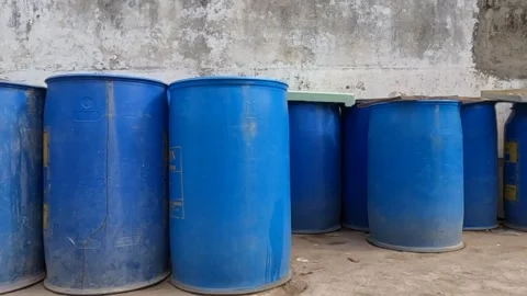 Plastic containers filled with water, Dr... | Stock Video | Pond5