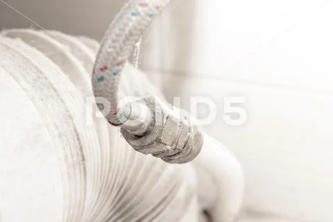Photograph: Plastic corrugated pan pipe and water supply fitting for ...