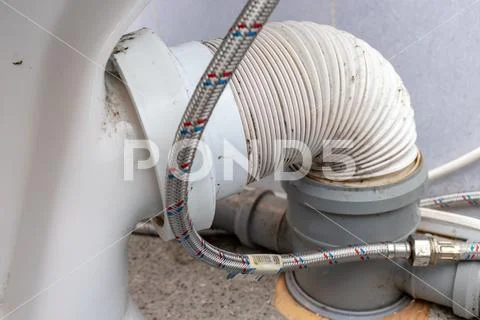 Plastic corrugated pan pipe and water supply fitting for the toilet ...