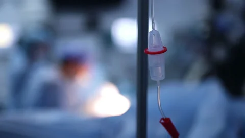 Plastic drop counter hanging in the surg... | Stock Video | Pond5