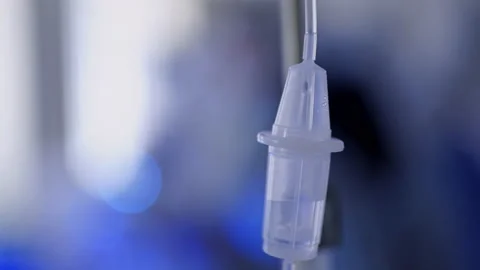 Plastic dropper on blue background. Hosp... | Stock Video | Pond5