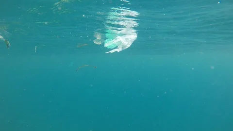 Plastic pollution in ocean | Stock Video | Pond5