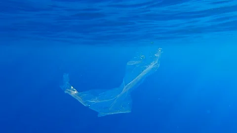 Plastic pollution. A piece of plastic ba... | Stock Video | Pond5