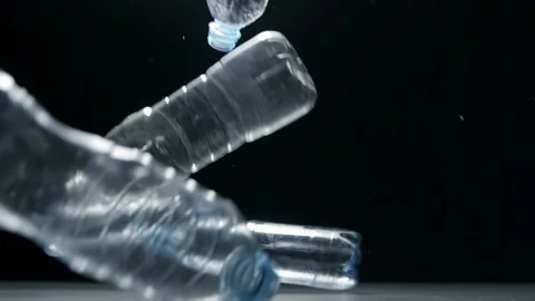Plastic pollution. Plastic Bottle fallin... | Stock Video | Pond5
