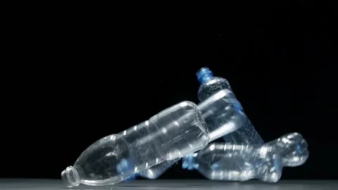 Plastic pollution. Plastic Bottle fallin... | Stock Video | Pond5