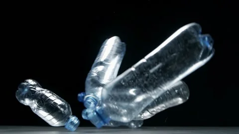 Plastic pollution. Plastic Bottle fallin... | Stock Video | Pond5