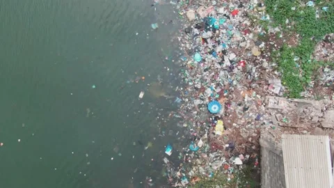 plastic waste on a beach in Monrovia, Li... | Stock Video | Pond5