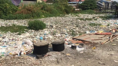 Plastic Waste Garbage in Sewage Canal Sl... | Stock Video | Pond5