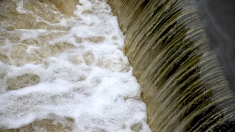 Plastic water bottle stuck in flowing wa... | Stock Video | Pond5