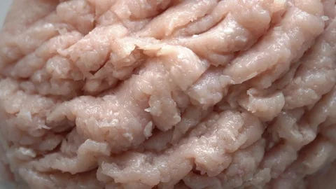 Plate with raw ground chicken meat rotat... | Stock Video | Pond5
