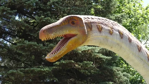 Platesaurus dinosaur model in the wild. ... | Stock Video | Pond5