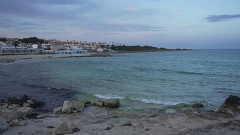 Playa Punta Prima Beach at dusk, Punta P... | Stock Video | Pond5