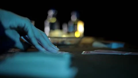 Players picking up cards from the table ... | Stock Video | Pond5
