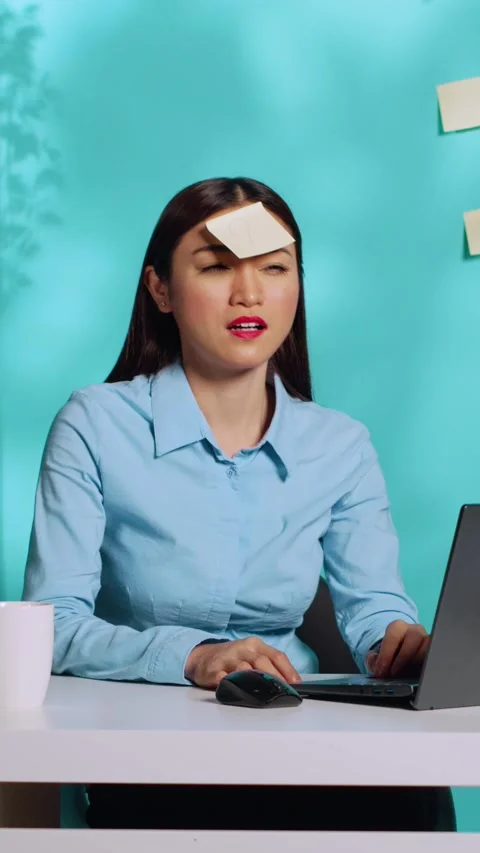 Playful employee having fun in office | Stock Video | Pond5