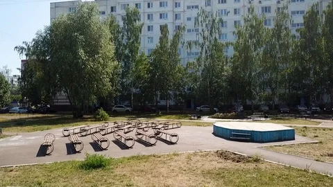 Playground with a stage in the courtyard... | Stock Video | Pond5
