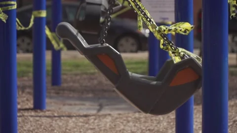 Playground swing for babies rocking slow... | Stock Video | Pond5