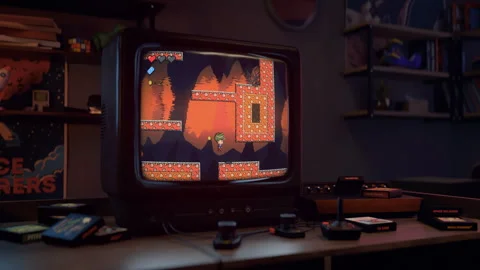 Playing the 2d vintage nostalgia console... | Stock Video | Pond5