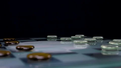 playing glass checkers board game 4k | Stock Video | Pond5