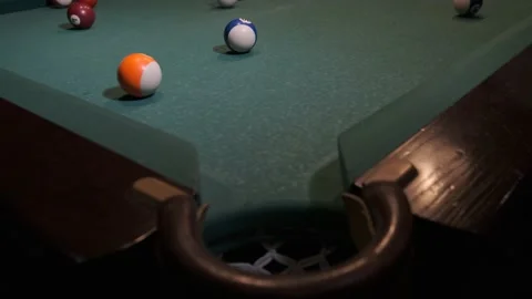 Playing pool billiards in a night bar | Stock Video | Pond5