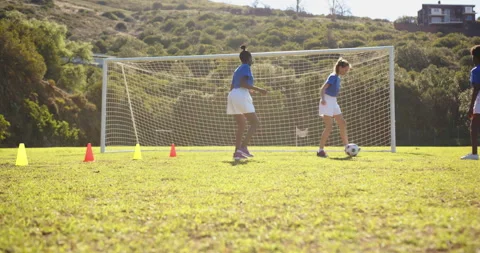 Playing soccer, girls practicing on scho... | Stock Video | Pond5