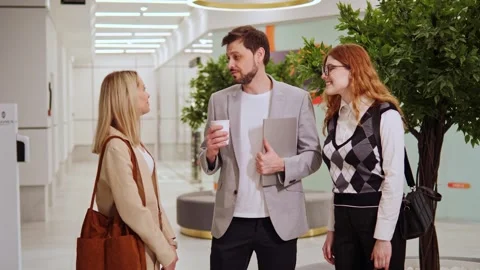 Pleasant, friendly conversation of three... | Stock Video | Pond5