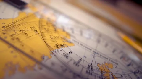 Plotting position on navigational chart ... | Stock Video | Pond5