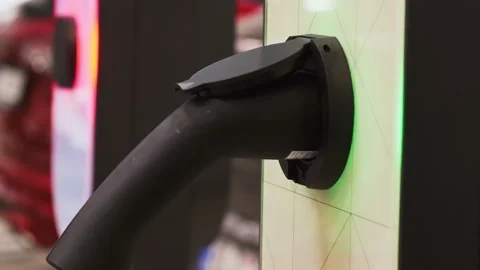 Plug connected to charging block illumin... | Stock Video | Pond5