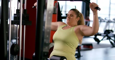 Plus Size Model, woman trains in Gym, li... | Stock Video | Pond5