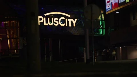 PlusCity shopping mall logo at night | Stock Video | Pond5