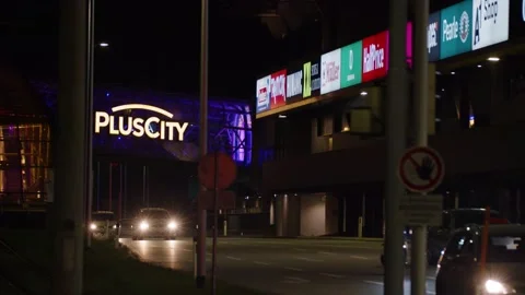 PlusCity shopping mall logo at night | Stock Video | Pond5
