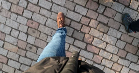 Point of view of man walking in cobblest... | Stock Video | Pond5