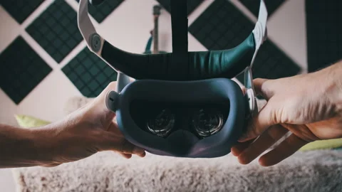 Point of View Young Man Putting on VR He... | Stock Video | Pond5