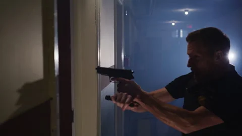 Police action cop stepping into an activ... | Stock Video | Pond5