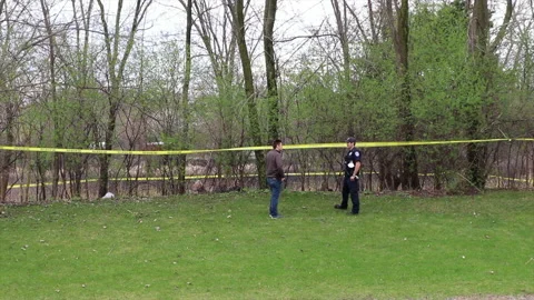 Police at active crime scene - outdoor | Stock Video | Pond5