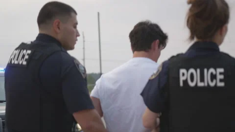 Policewoman Arresting and Handcuffing Man Stock Videos – Royalty-Free ...