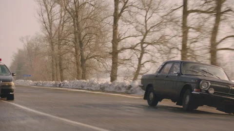 Police Car chasing a criminal on the roa... | Stock Video | Pond5