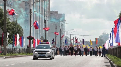Police car is on the head of procession.... | Stock Video | Pond5