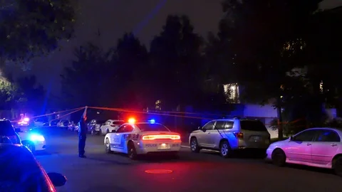 Police car passing perimeter to access c... | Stock Video | Pond5