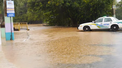 Police car road blockade during flood. | Stock Video | Pond5