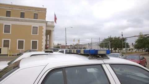 Police cars in parking lot of police sta... | Stock Video | Pond5