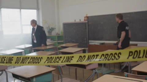 Police in a classroom school crime scene | Stock Video | Pond5