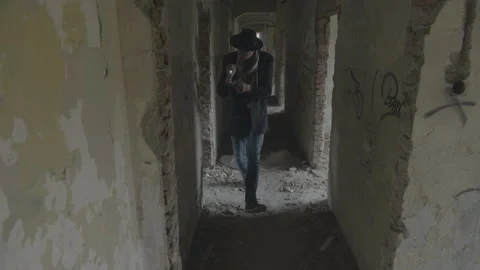 Police detective with handgun chasing ki... | Stock Video | Pond5