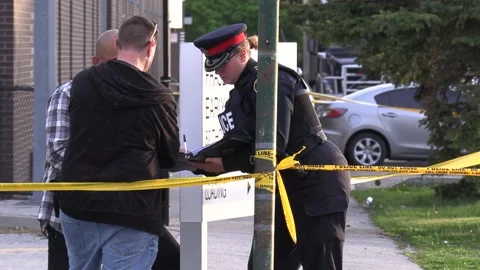 Police guard crime scene in Toronto afte... | Stock Video | Pond5